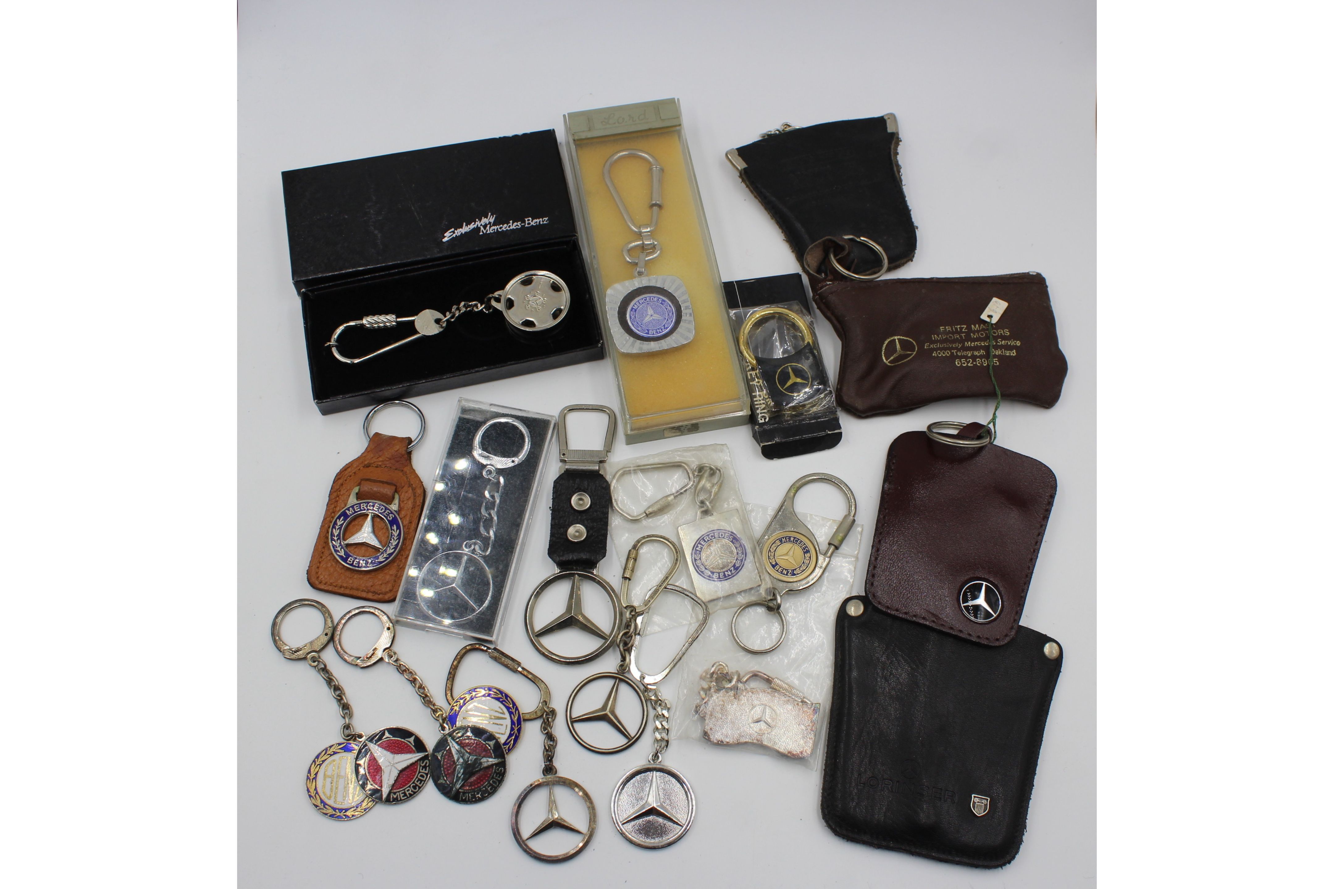Bonhams Cars : A group lot of Mercedes-Benz Keychains and Keywallets ...