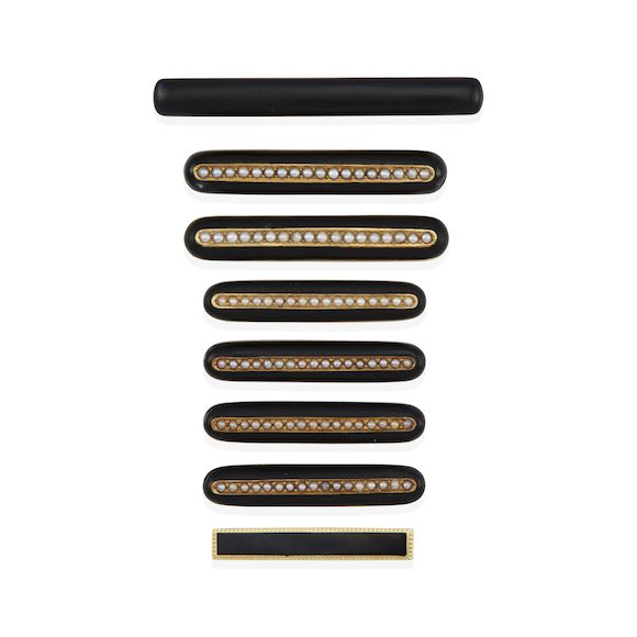Bonhams : EIGHT GOLD, ONYX, PEARL AND ENAMEL PINS