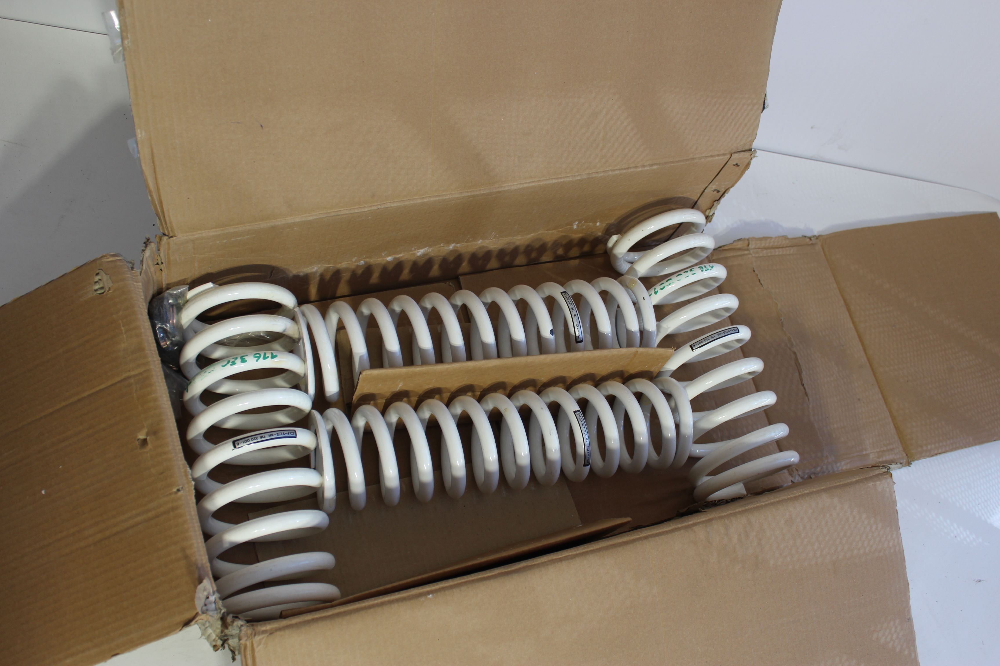 Bonhams Cars : A NOS, AMG-Bilstein for Mercedes-Benz W116 "White Springs,"