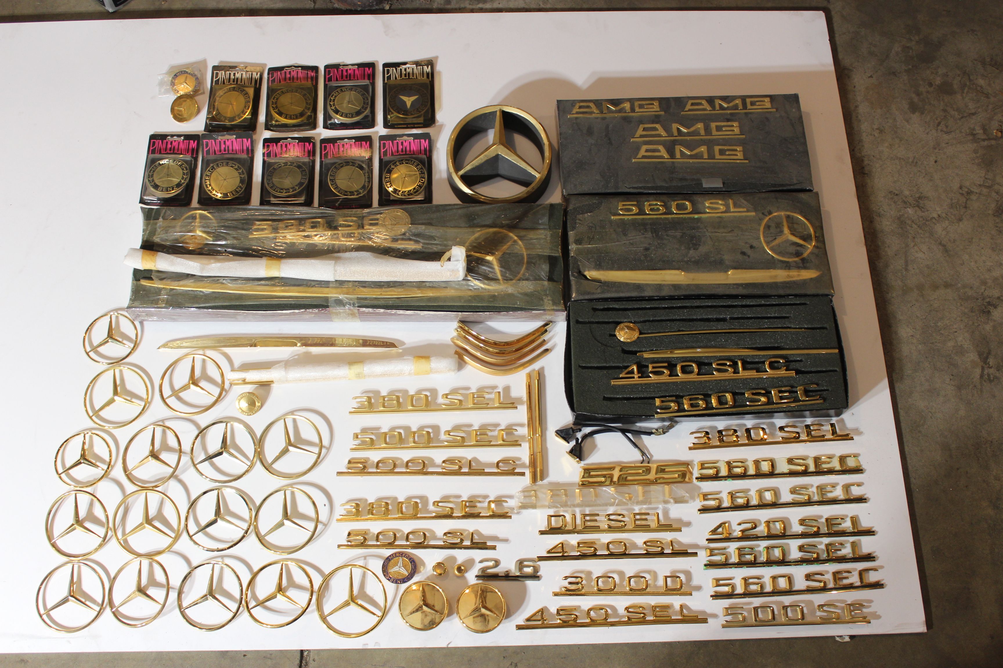 Bonhams Cars : A large grouping of gold tone, Mercedes-Benz replacement ...