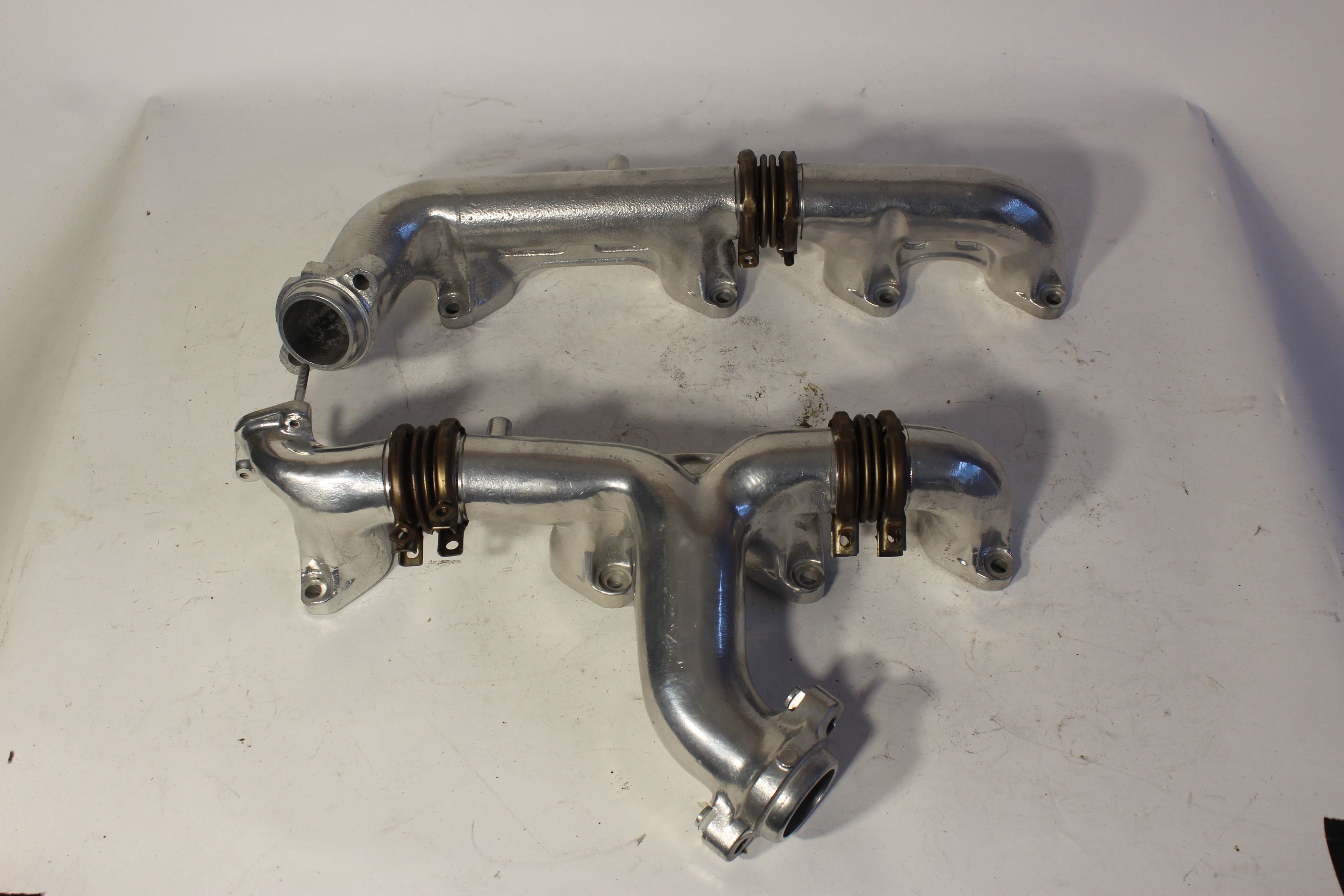 Bonhams Cars : A set of Mercedes-Benz M116/M117 plated, exhaust manifolds,