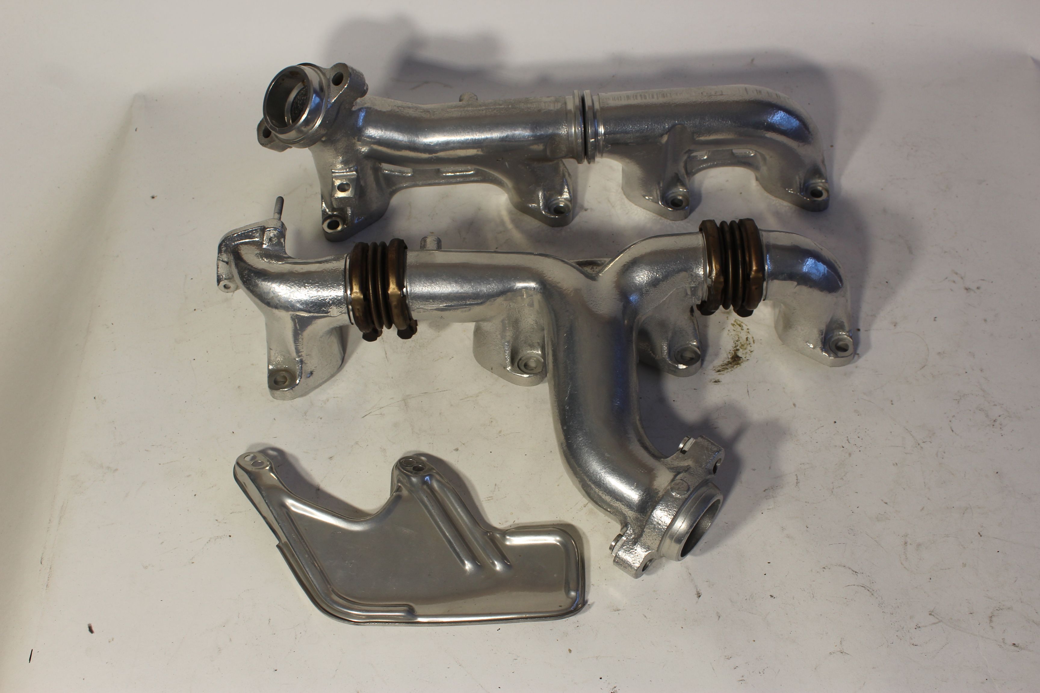 Bonhams Cars : A set of Mercedes-Benz M116/M117 plated, exhaust manifolds,