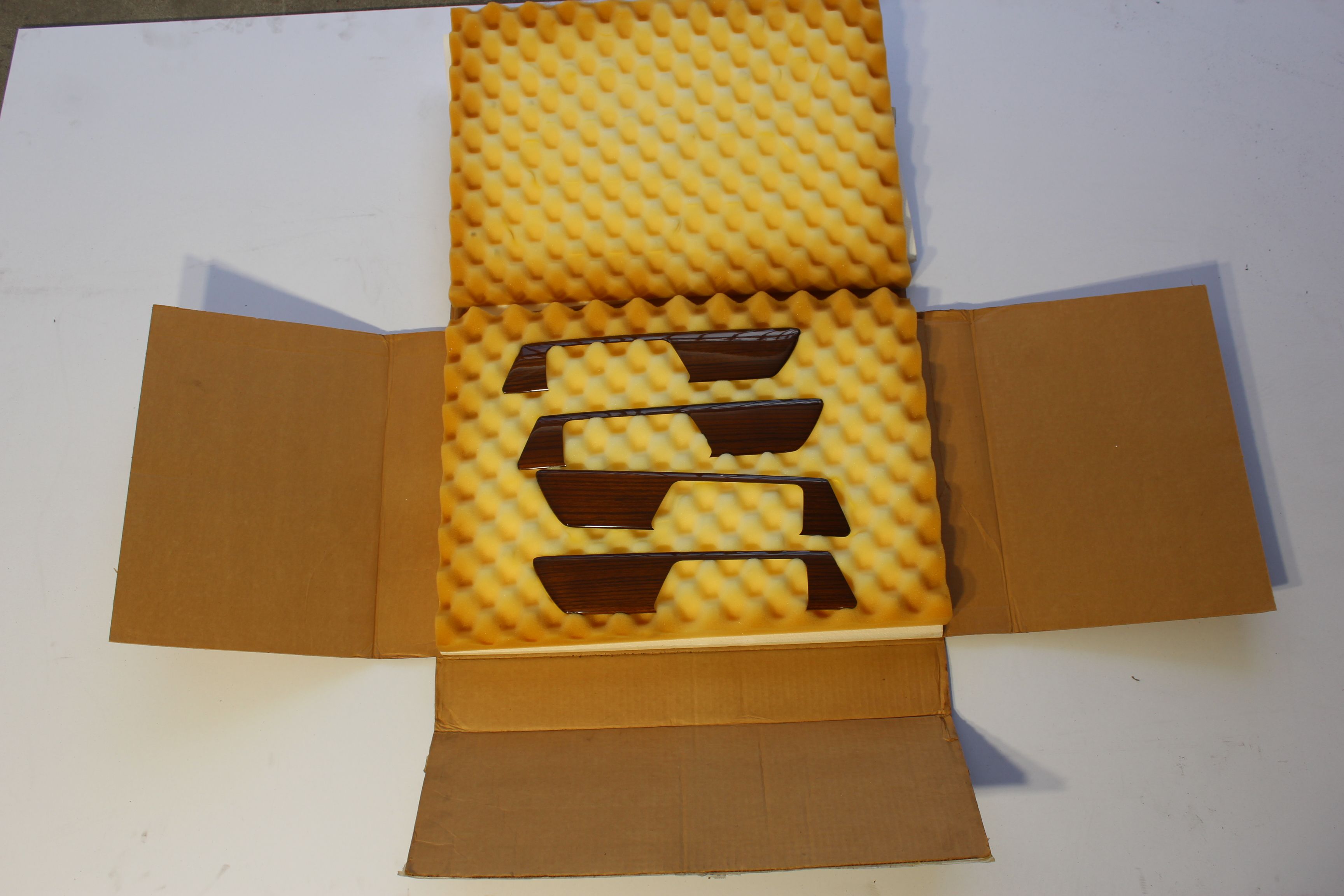 Bonhams Cars : An NOS, 4 piece, Zebrano wood interior trim kit,