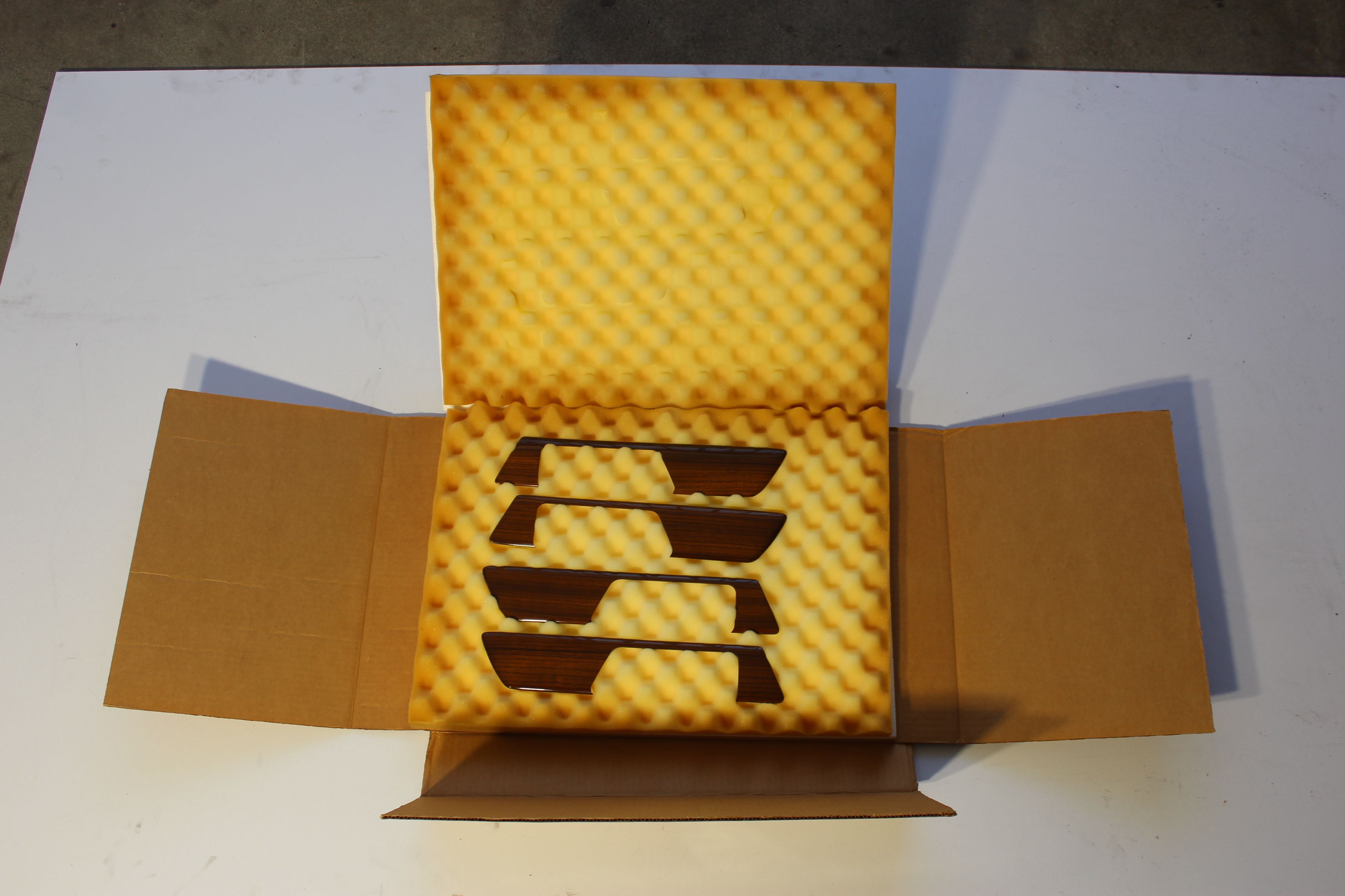 Bonhams Cars : An NOS, 4 piece, Zebrano wood interior trim kit,