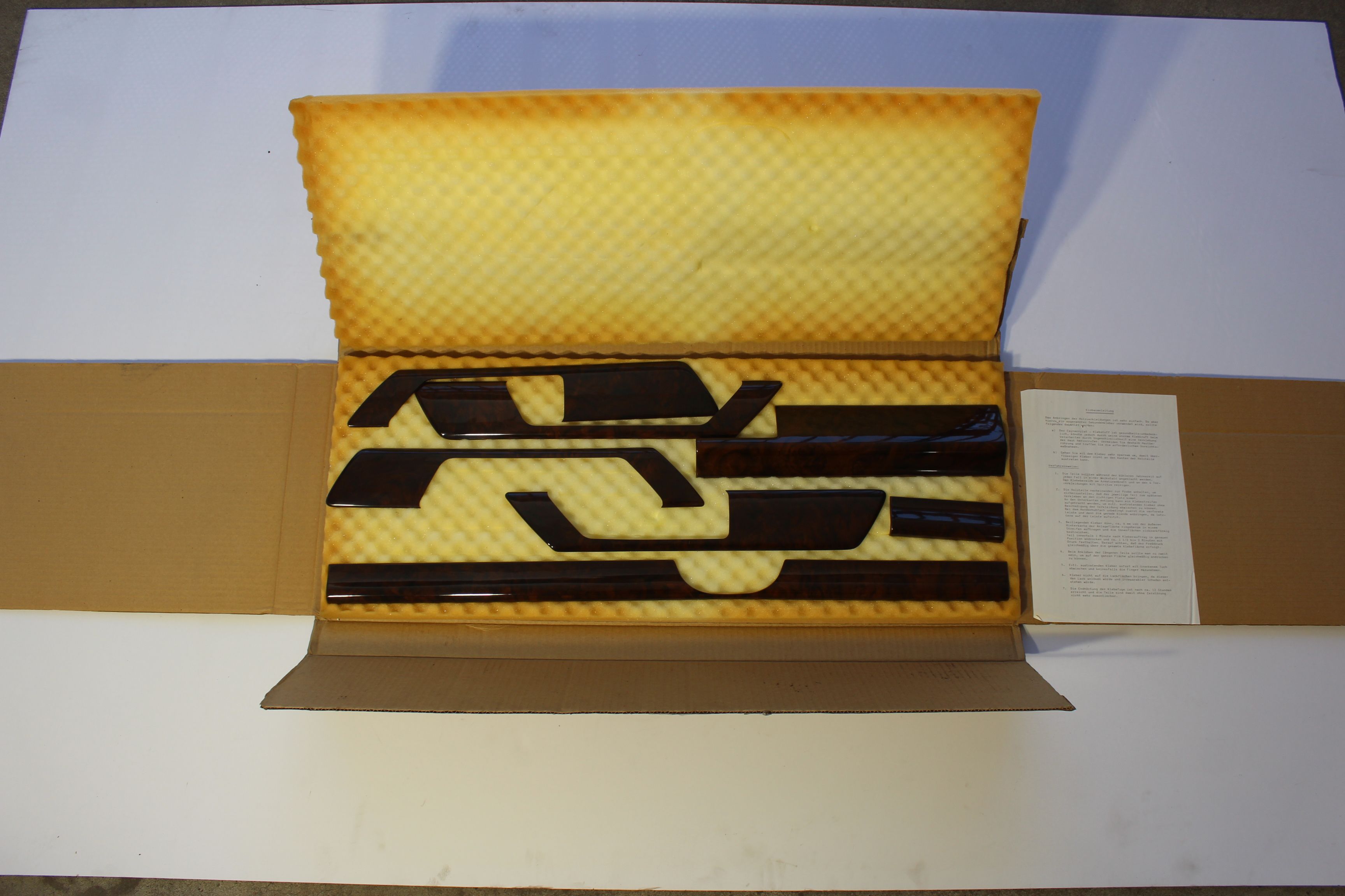 Bonhams Cars : An NOS, 7 piece, Burl wood, interior trim kit for a ...