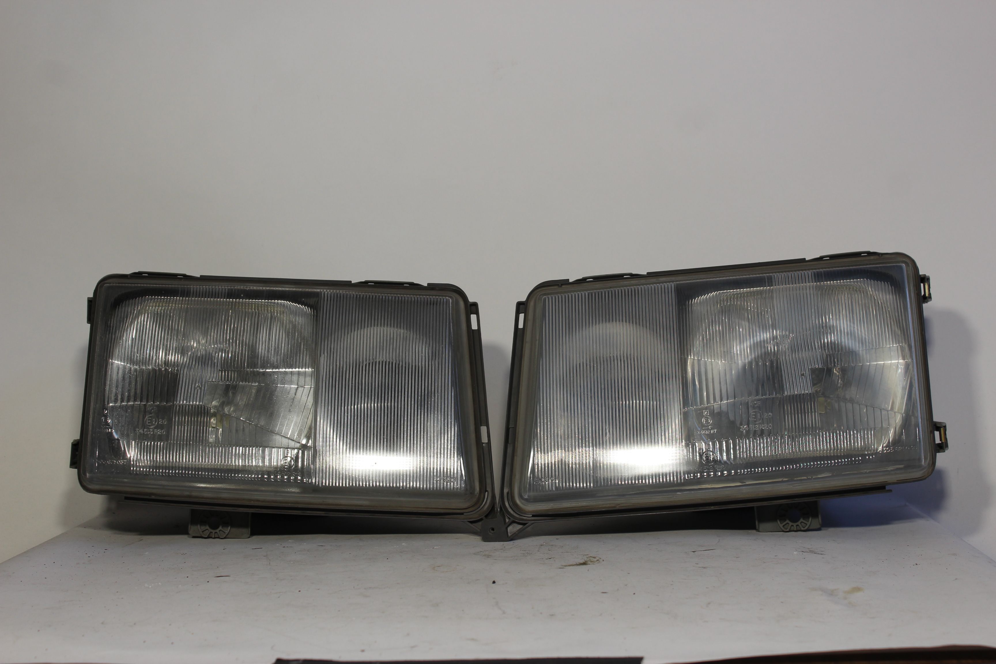 Bonhams Cars : A pair of Mercedes-Benz W124, Euro spec, headlight buckets,