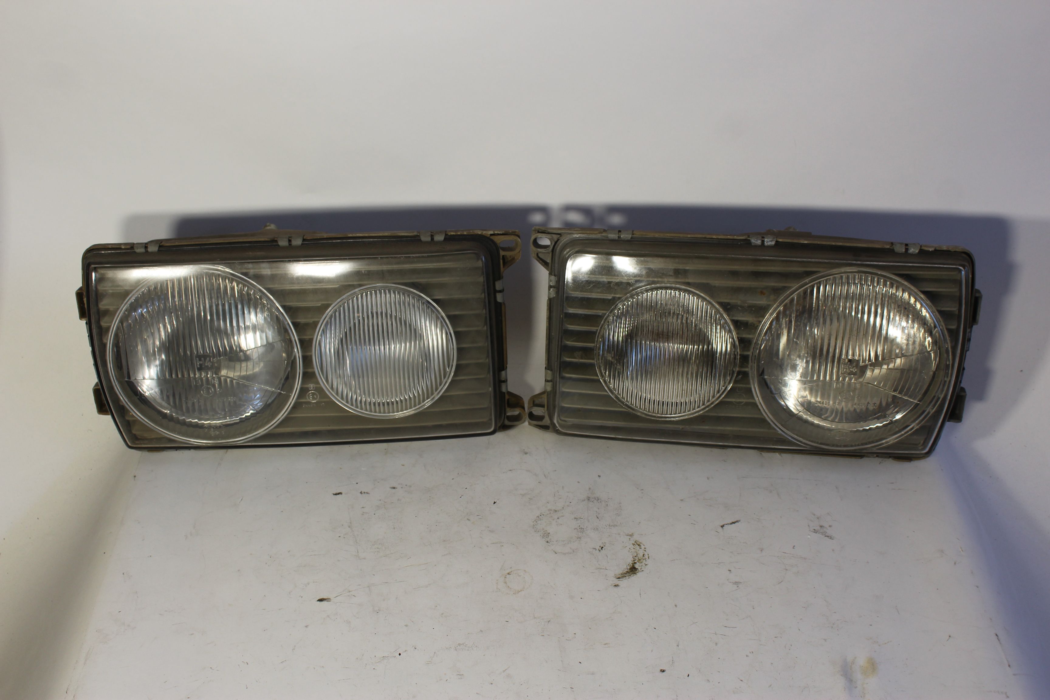 Bonhams Cars : A pair of Mercedes-Benz W123, Euro spec, headlight buckets,