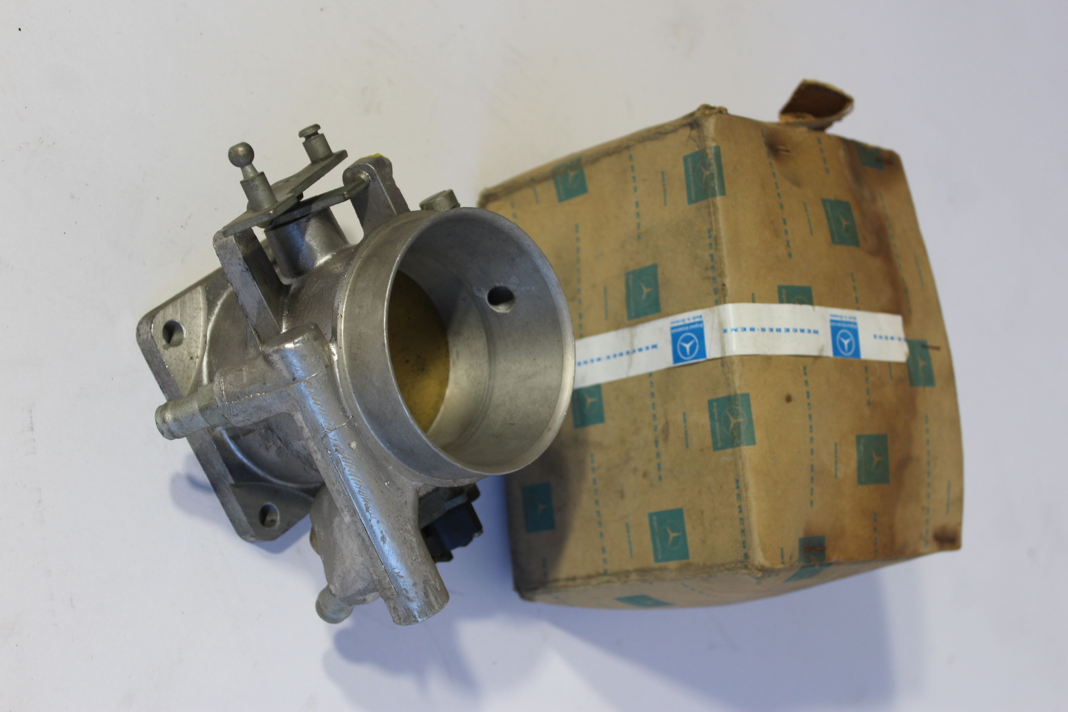 Bonhams Cars : An NOS, OEM, Mercedes-Benz M130 throttle body,