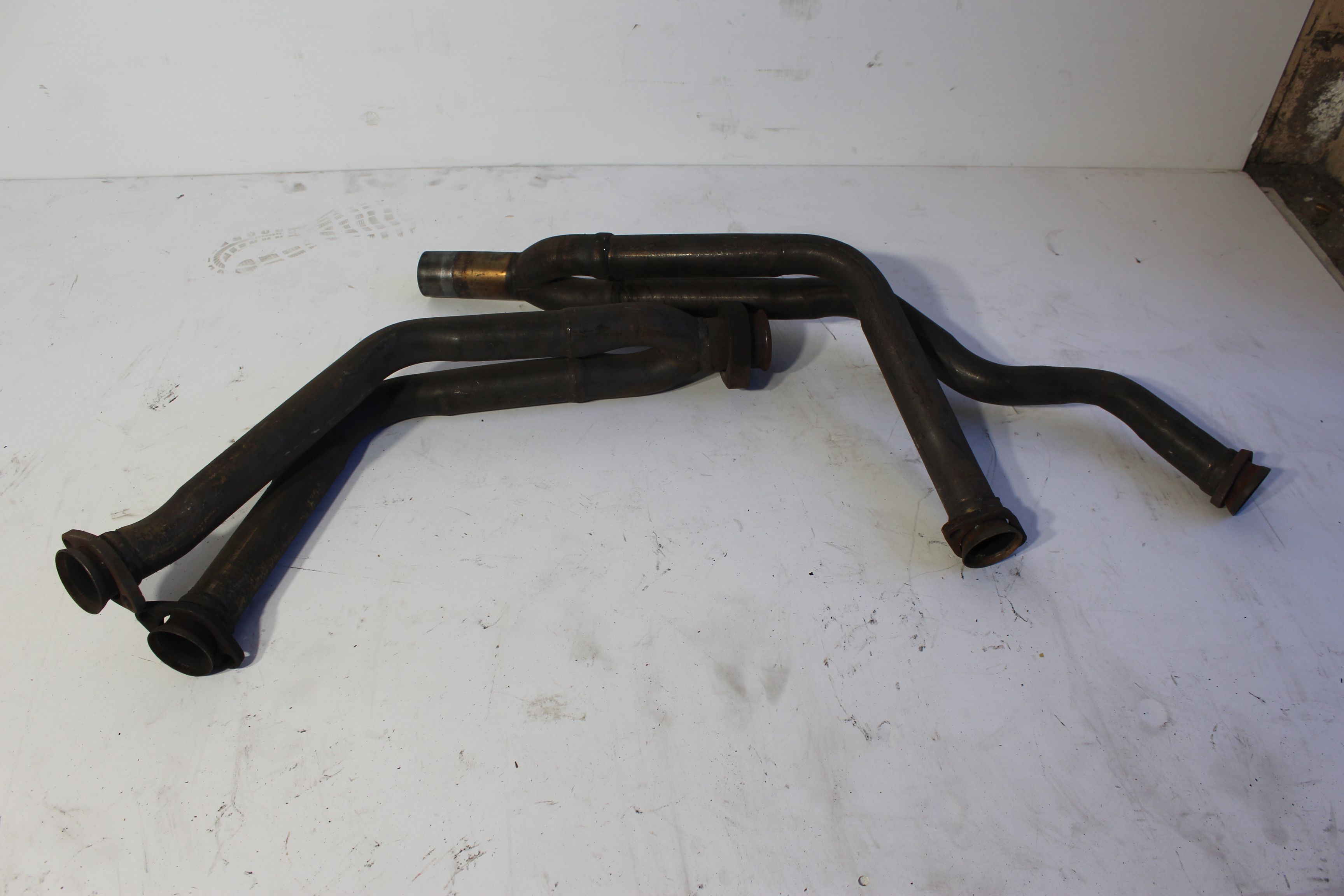 Bonhams Cars : A set of exhaust down pipes suitable for a Mercedes-Benz V-8