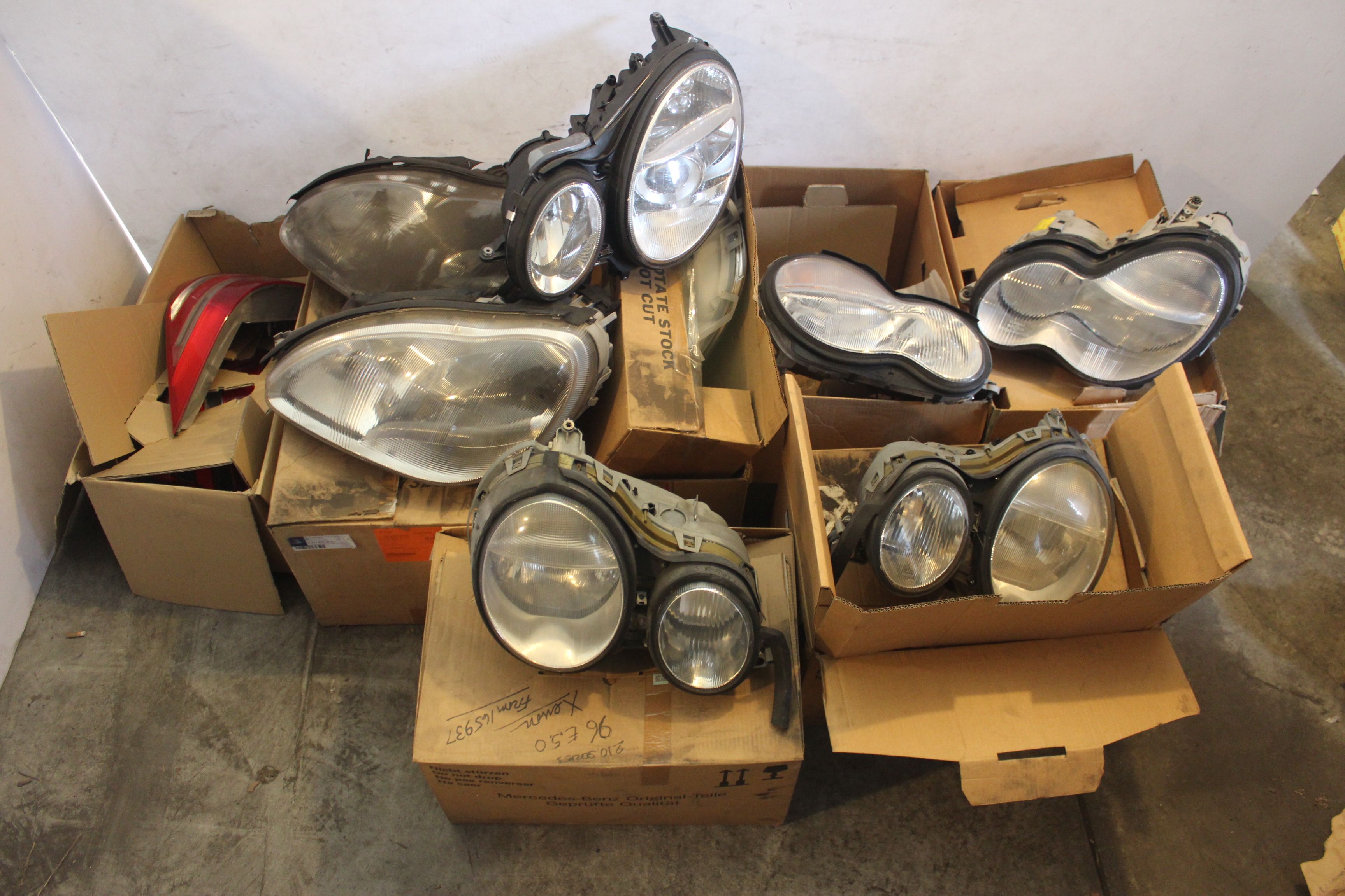 Bonhams Cars : A grouping of 13, 2000s era Mercedes-Benz headlight ...