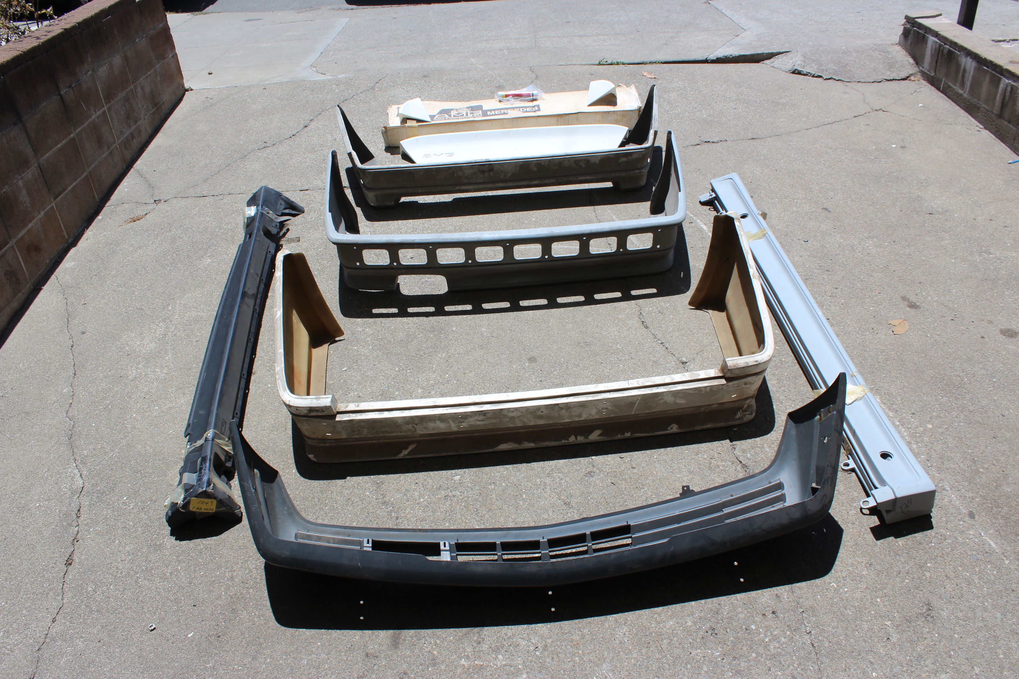 Bonhams Cars : A grouping of body parts suitable for Mercedes-Benz W/S124,