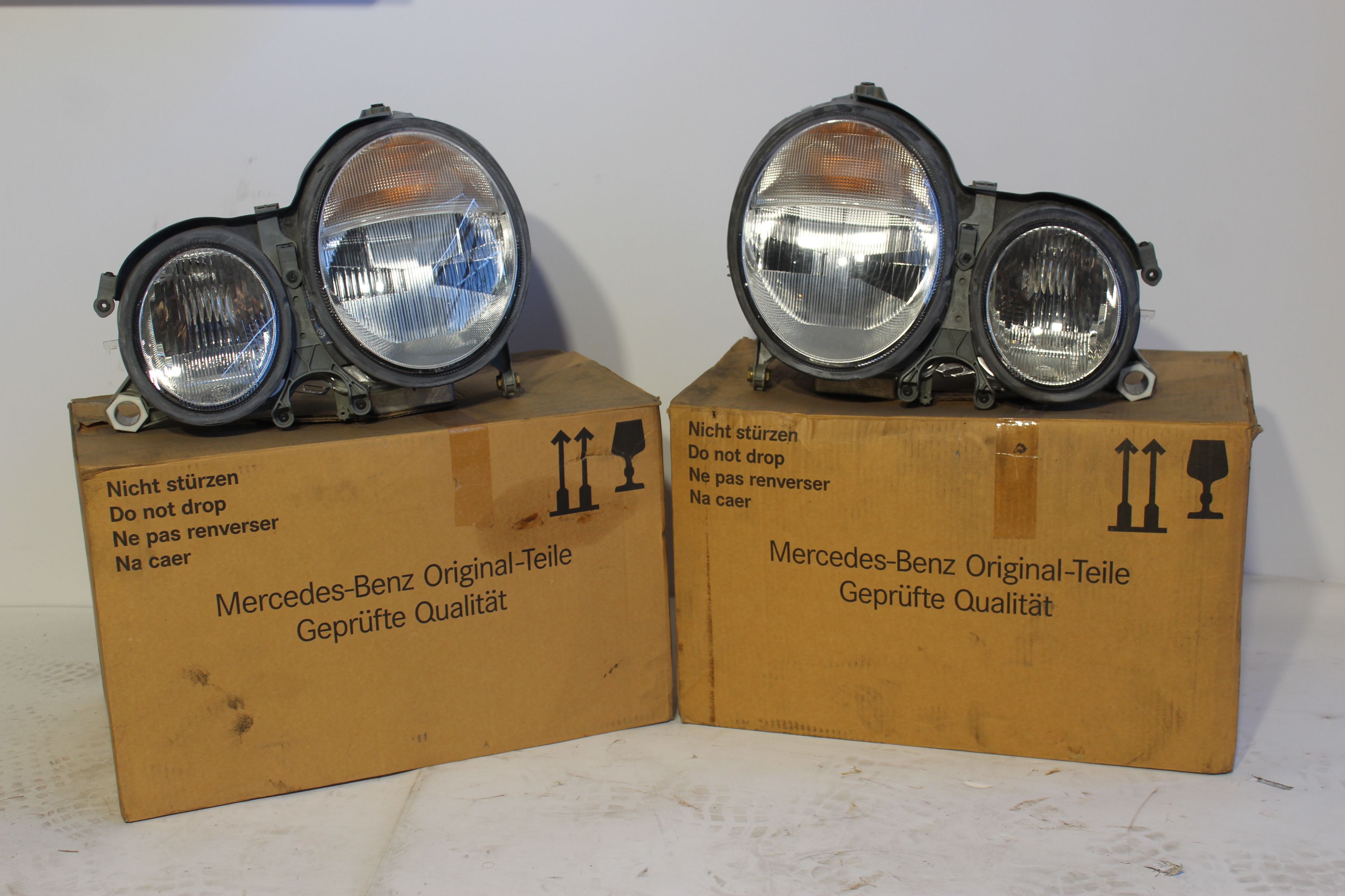 Bonhams Cars : A pair of Mercedes-Benz, Xenon headlight buckets for ...