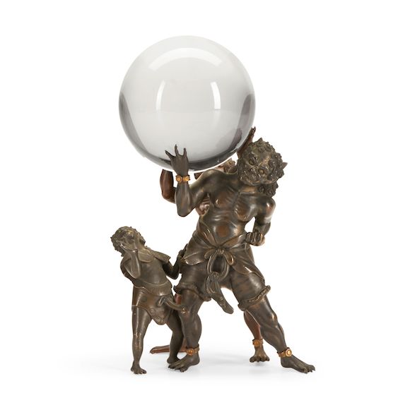 Bonhams Skinner : A MIXED METAL OKIMONO OF THREE ONI SUPPORTING A GLASS ...