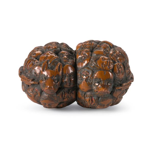 Bonhams Skinner : A WOOD NETSUKE OF A DOUBLE WALNUT WITH NOH MASKS Edo ...