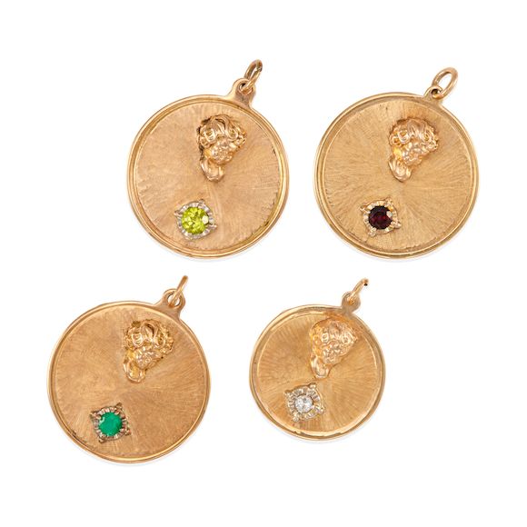 Bonhams : GROUP OF 14K GOLD AND GEM-SET FIGURAL DISK PENDANT CHARMS