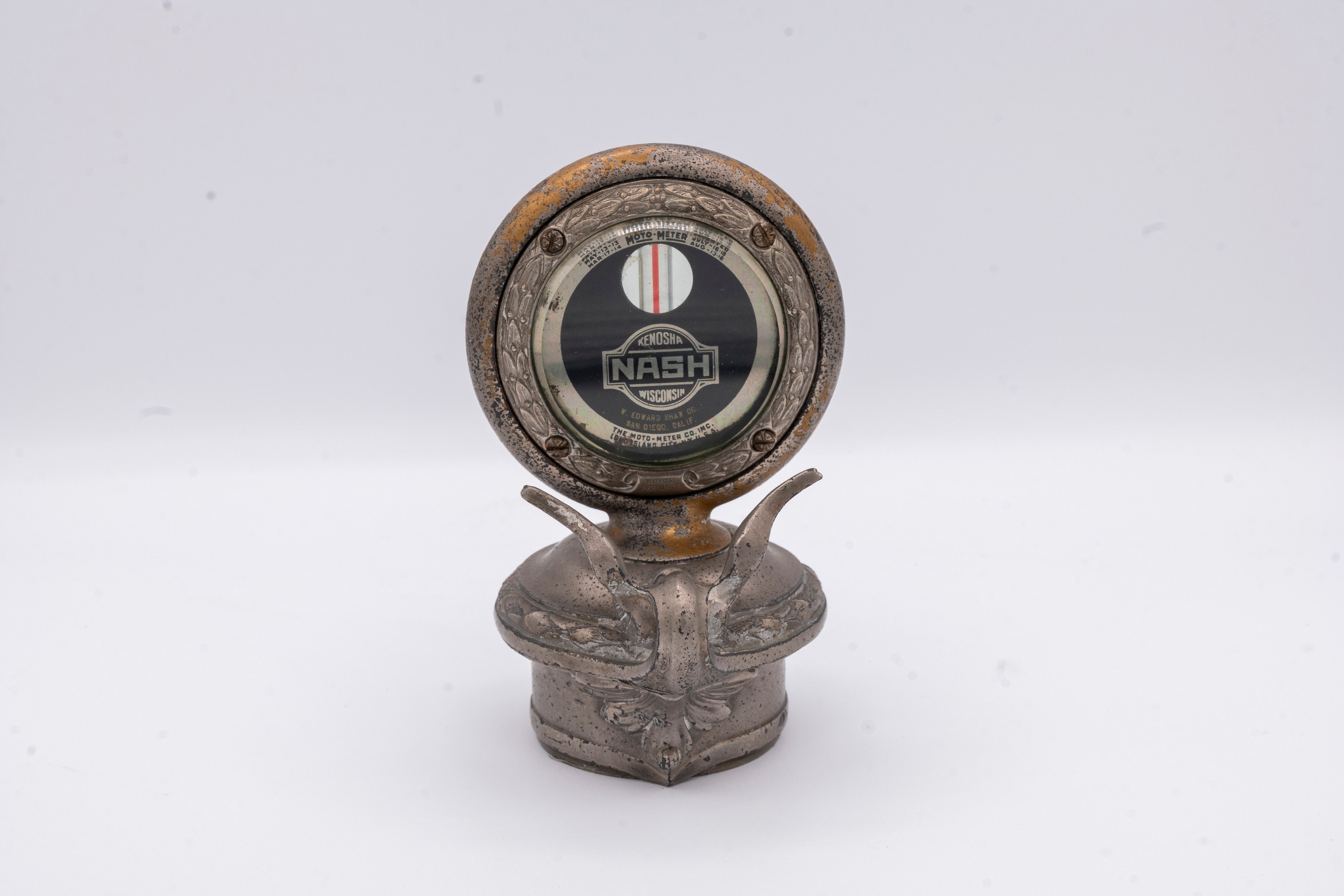 Bonhams Cars : A Nash 'Winged Wheel cap with branded Boyce Moto-meter