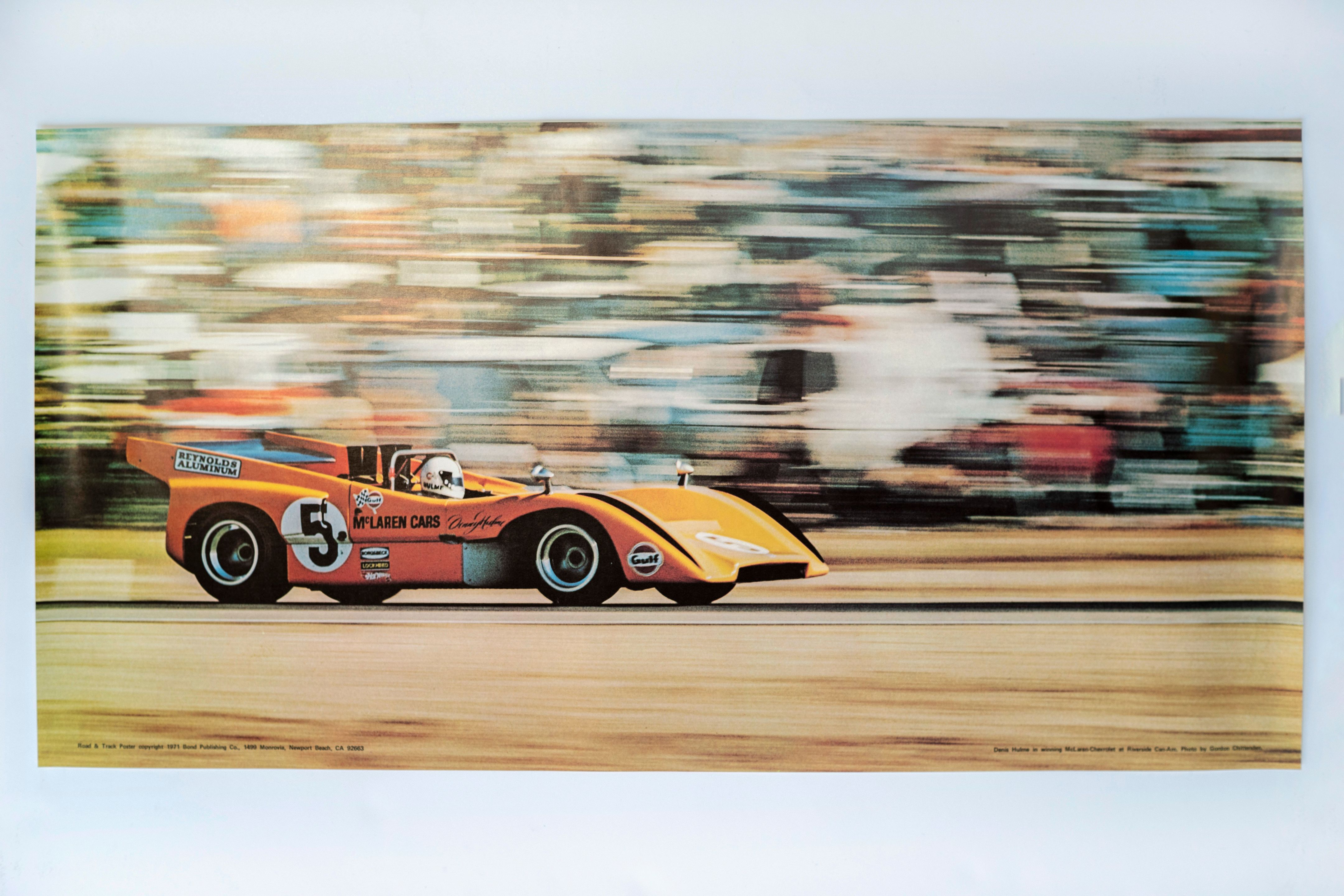 Bonhams Cars : Denis Hulme in wining McLaren-Chevrolet at Riverside Can ...