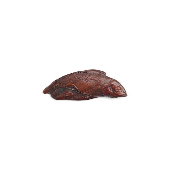 Bonhams : A WOOD NETSUKE OF A FISH Edo period (1615-1868), 19th century