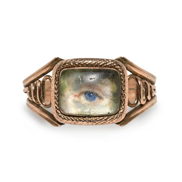 Bonhams Skinner : A 'LOVER'S EYE' GOLD AND EYE MINIATURE RING
