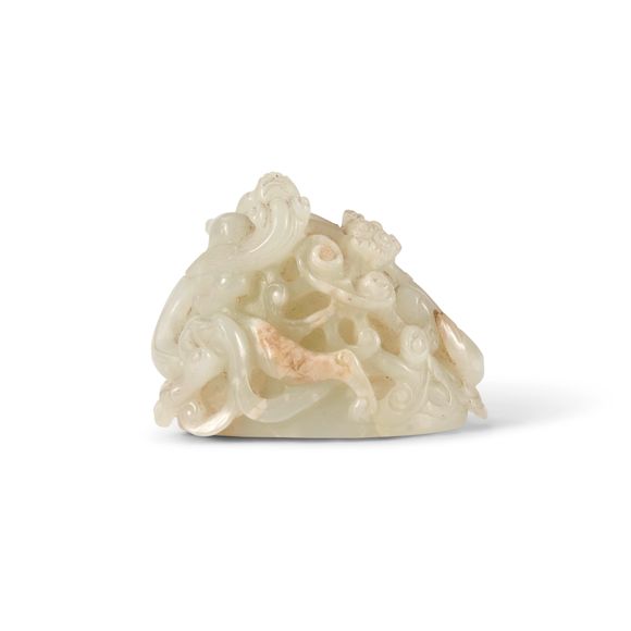 Bonhams Skinner : A WHITE JADE HAT FINIAL WITH CHILONG MOTIF 20th century