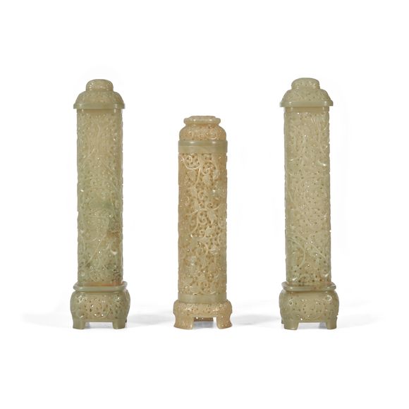 Bonhams Skinner : THREE PALE CELADON JADE RETICULATED CYLINDRICAL ...