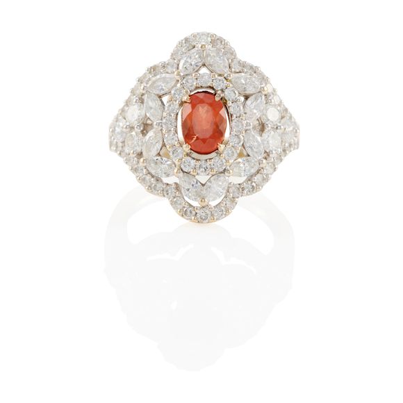 Bonhams : 18K BI-COLOR GOLD, GARNET AND DIAMOND RING