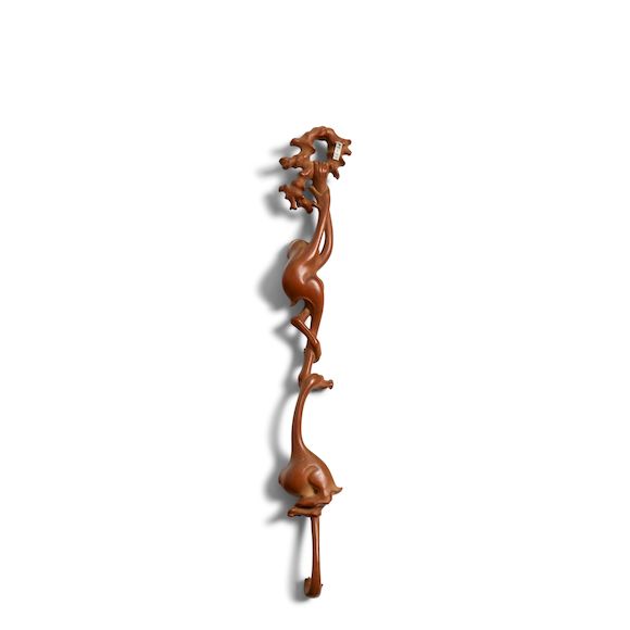 Bonhams Skinner : A BOXWOOD OKIMONO OF TWO MONKEYS HANGING FROM A ...