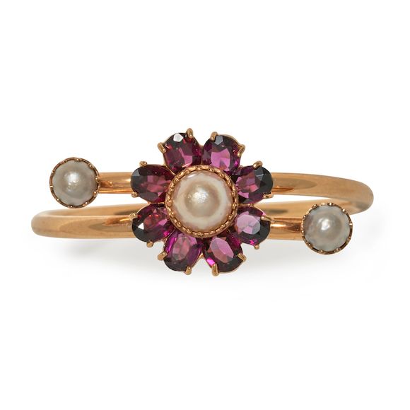 Bonhams Skinner : LUCIEN PICCARD A 14K GOLD, RHODOLITE GARNET, AND ...