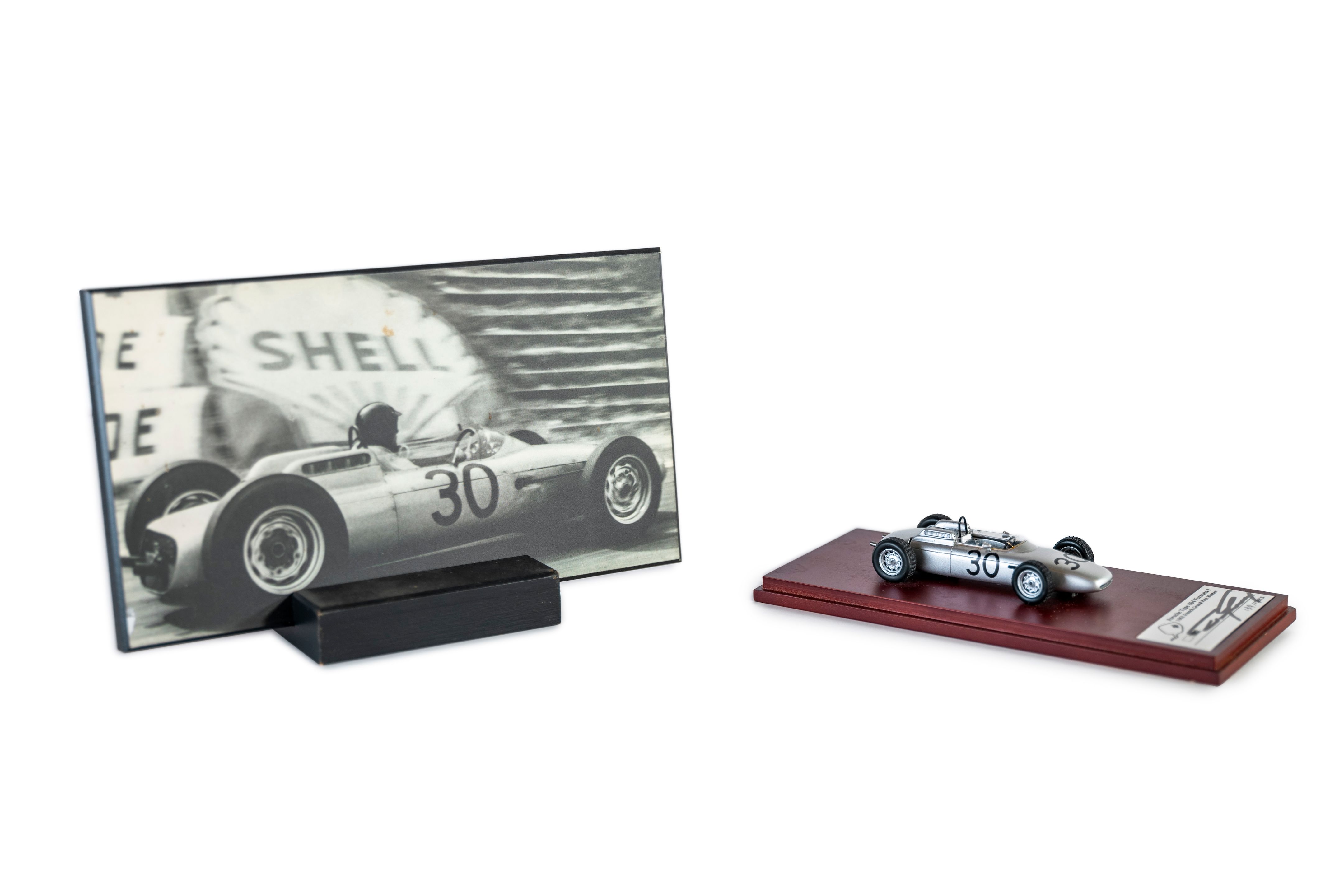 Bonhams Cars : A Dan Gurney signed Porsche 804 model with photo,