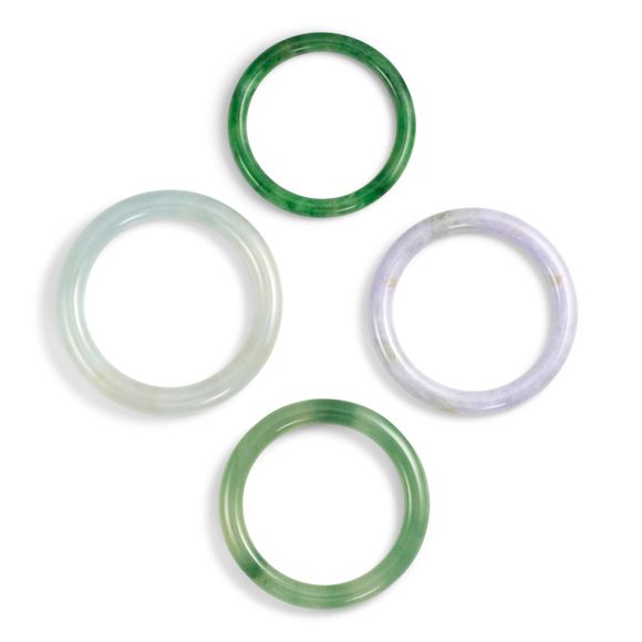 Bonhams : FOUR JADEITE BANGLES 20th century (4)