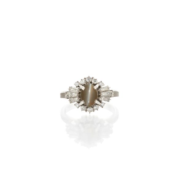 Bonhams Skinner : A PLATINUM, CAT'S-EYE CHRYSOBERYL, AND DIAMOND RING