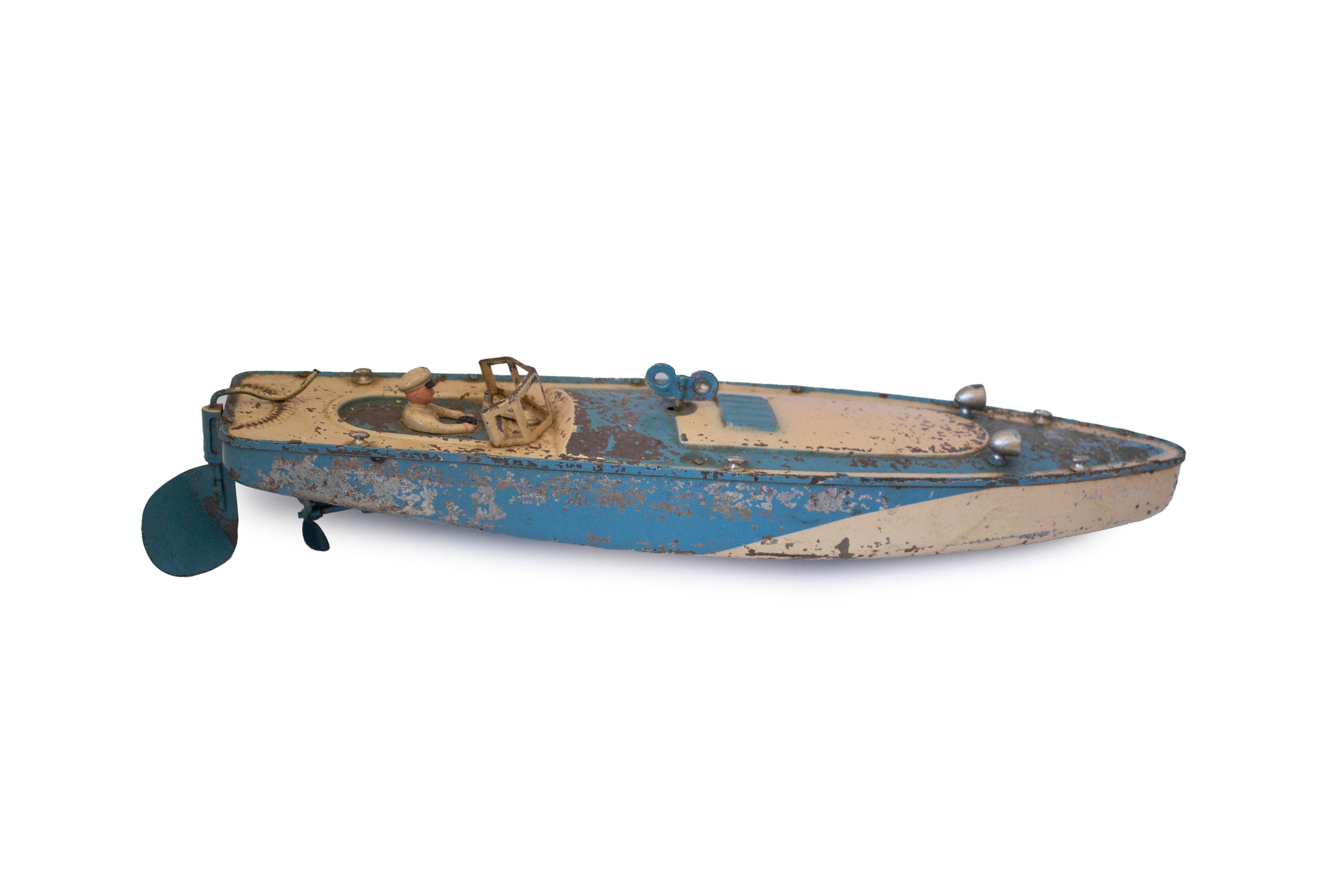 Bonhams Cars : A JEP tinplate clockwork toy boat, circa 1935,