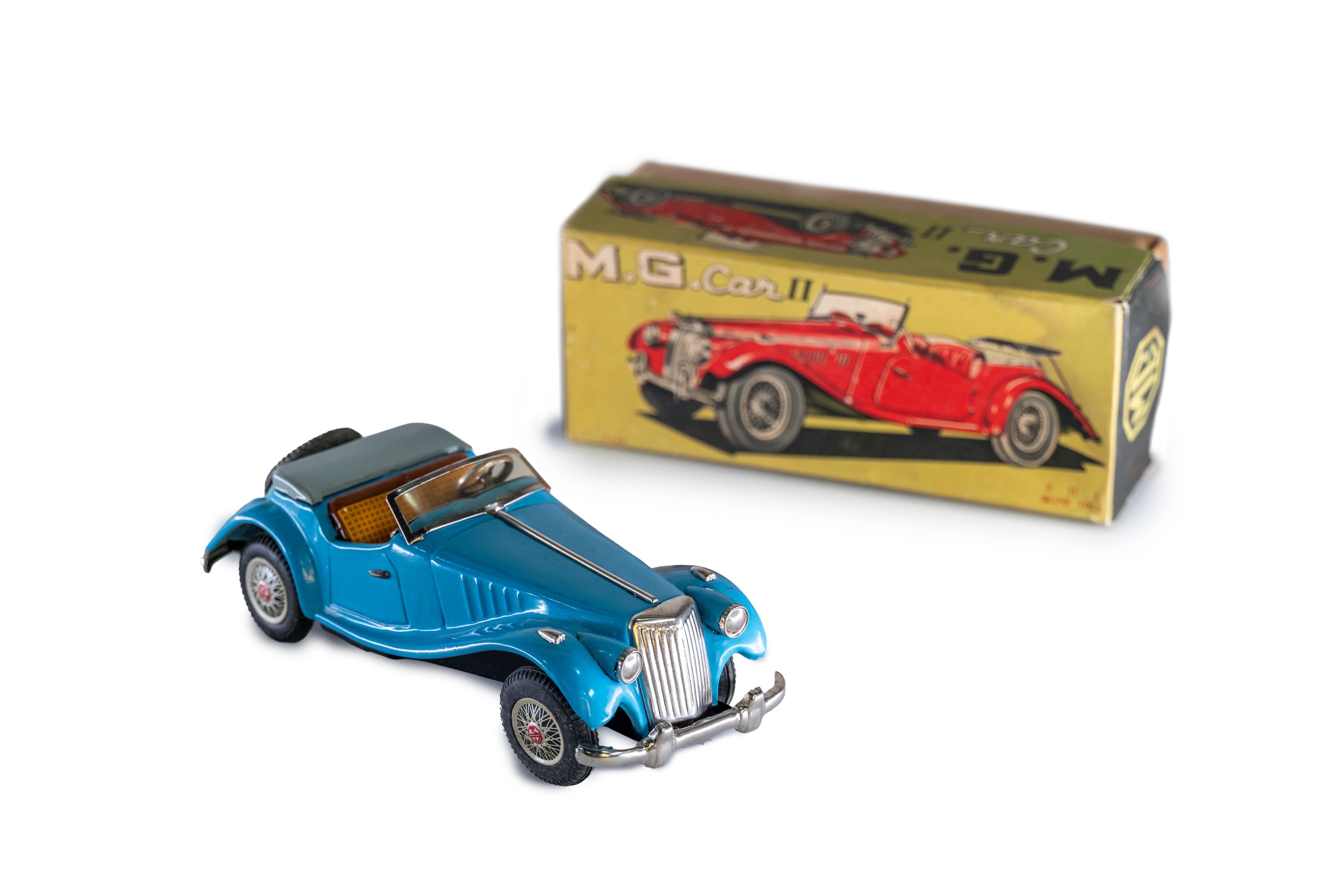 Bonhams Cars : AMG Car II tinplate friction toy, by AHI,