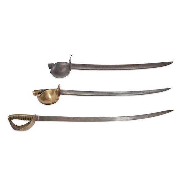 Bonhams Skinner : THREE 19TH CENTURY NAVAL CUTLASSES.