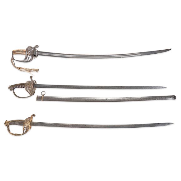 Bonhams Skinner : THREE 19TH CENTURY SPANISH/SPANISH COLONIAL SWORDS.