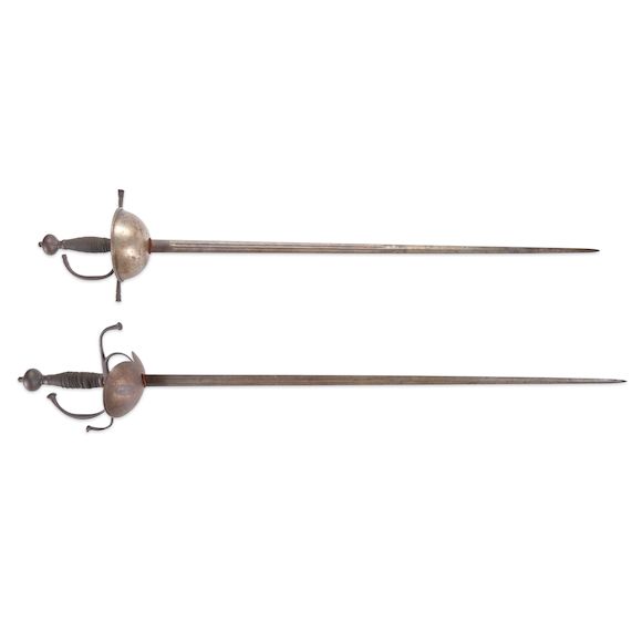 Bonhams Skinner : TWO VICTORIAN REPRODUCTION RAPIERS.