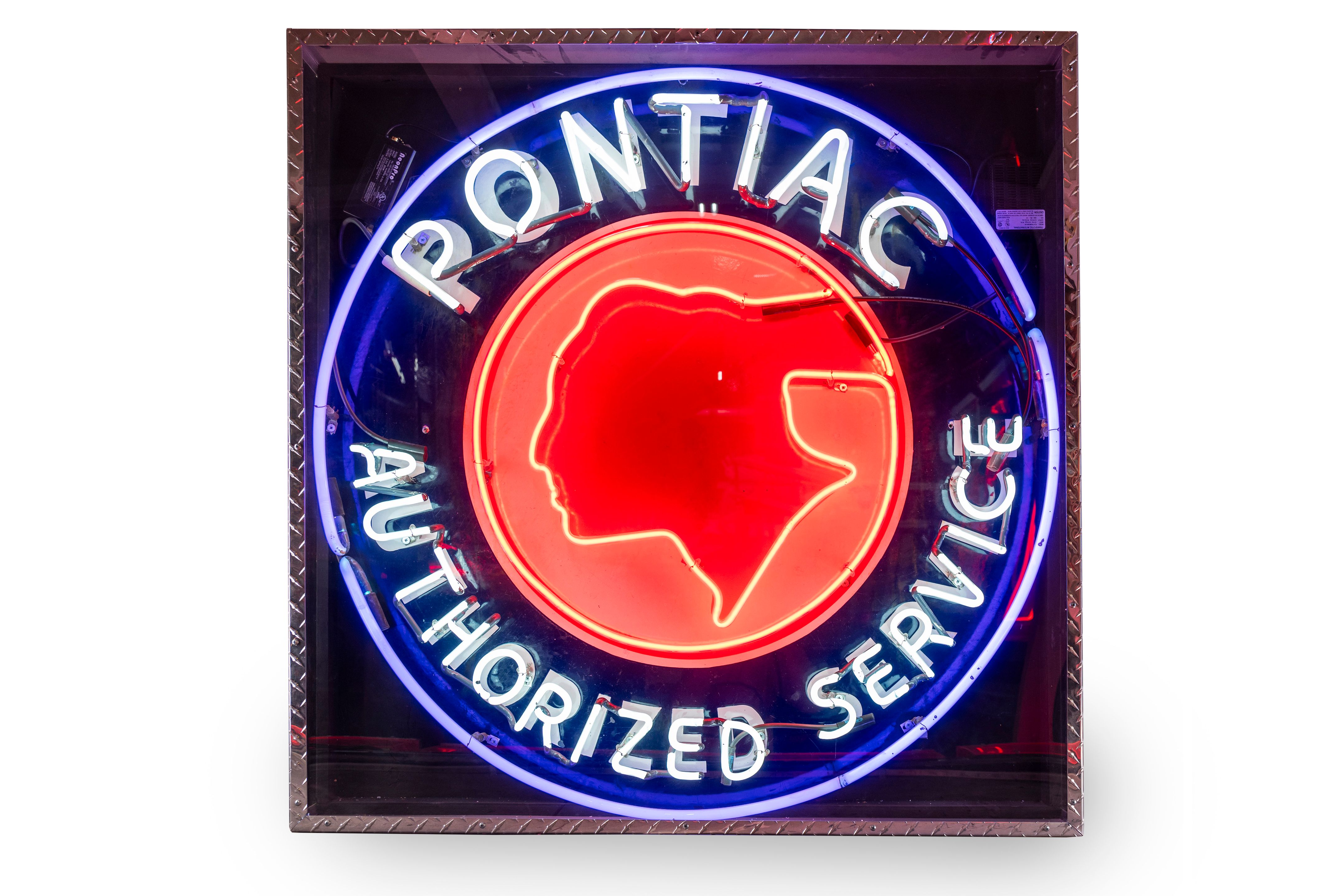 Bonhams Cars : A Pontiac Authorized Service porcelain sign with neon added,