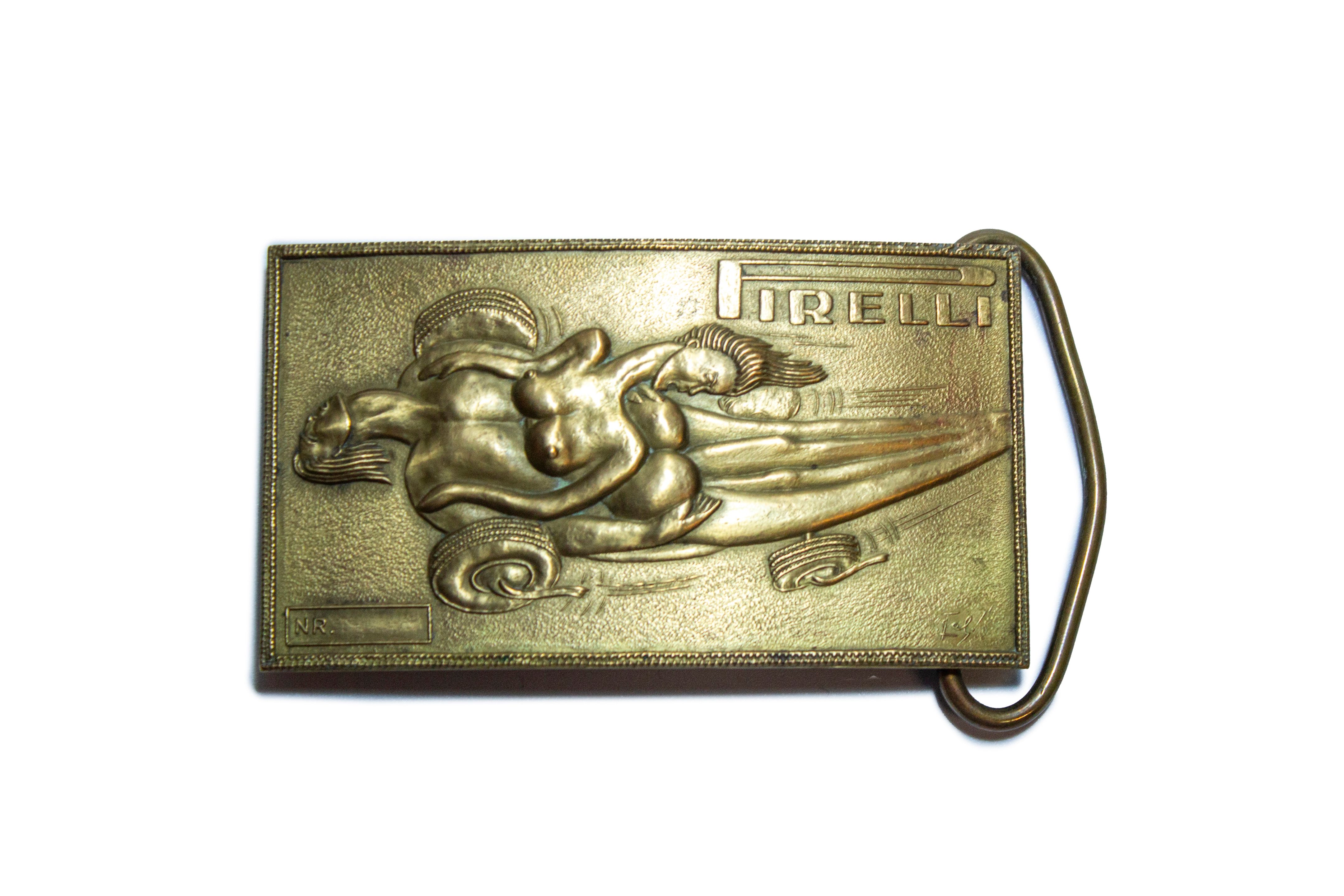 Bonhams Cars : A rare Pirelli belt buckle designed by Salvador Dali ...