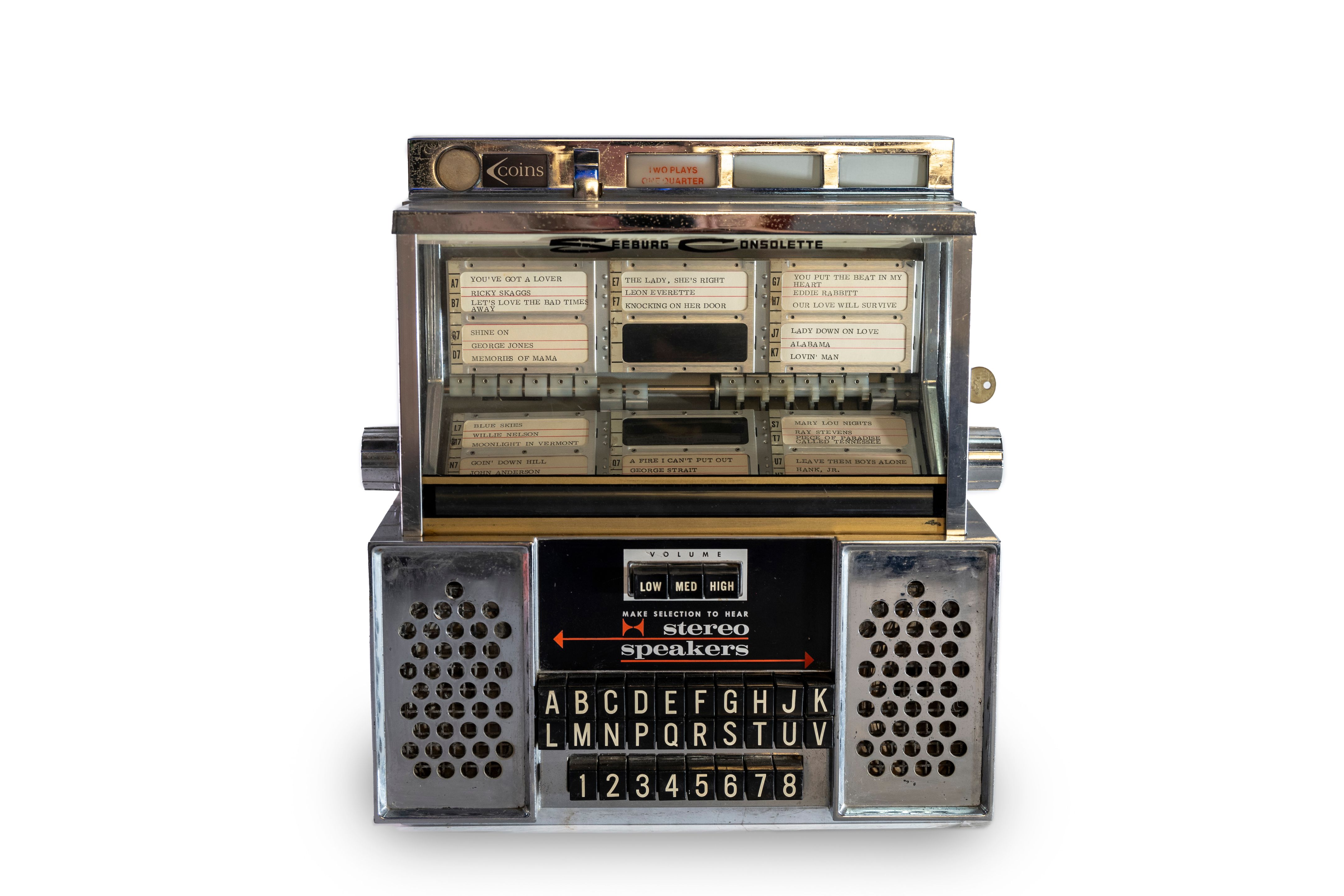 Bonhams Cars : A 'Seeburg Consolette' tabletop coin-op juke box,