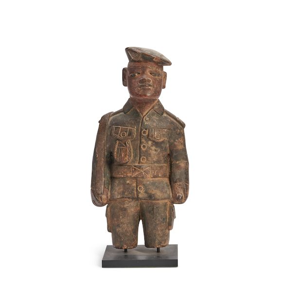 Bonhams Skinner : CERAMIC POLYCHROME COLONIAL ARMY FIGURE