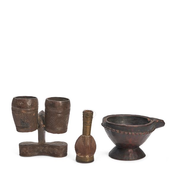 Bonhams Skinner : THREE AFRICAN CARVED WOOD OBJECTS