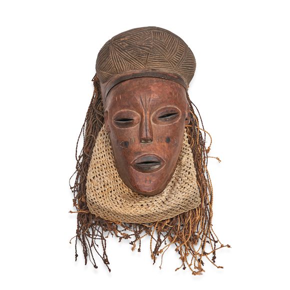 Bonhams Skinner : CARVED WOOD NDEMBU MASK