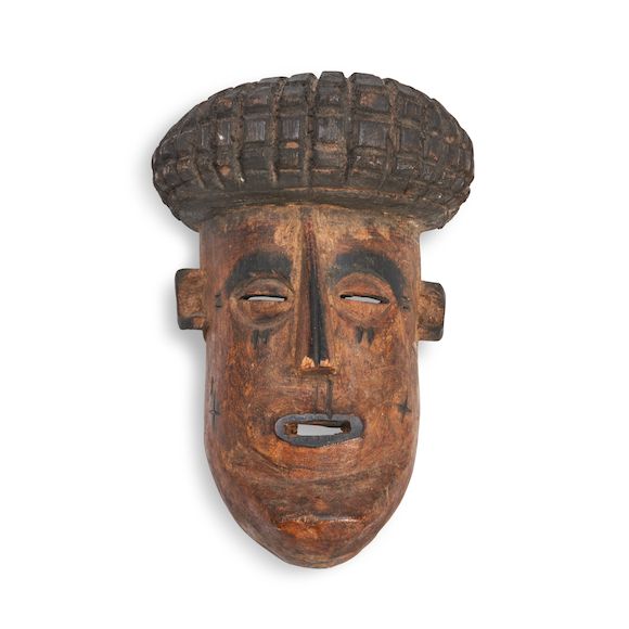 Bonhams Skinner : NDEMBU CARVED WOOD MASK