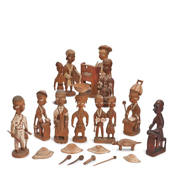 Bonhams Skinner : COLLECTION OF THOMAS ONA WOOD FIGURES Thomas Ona ...