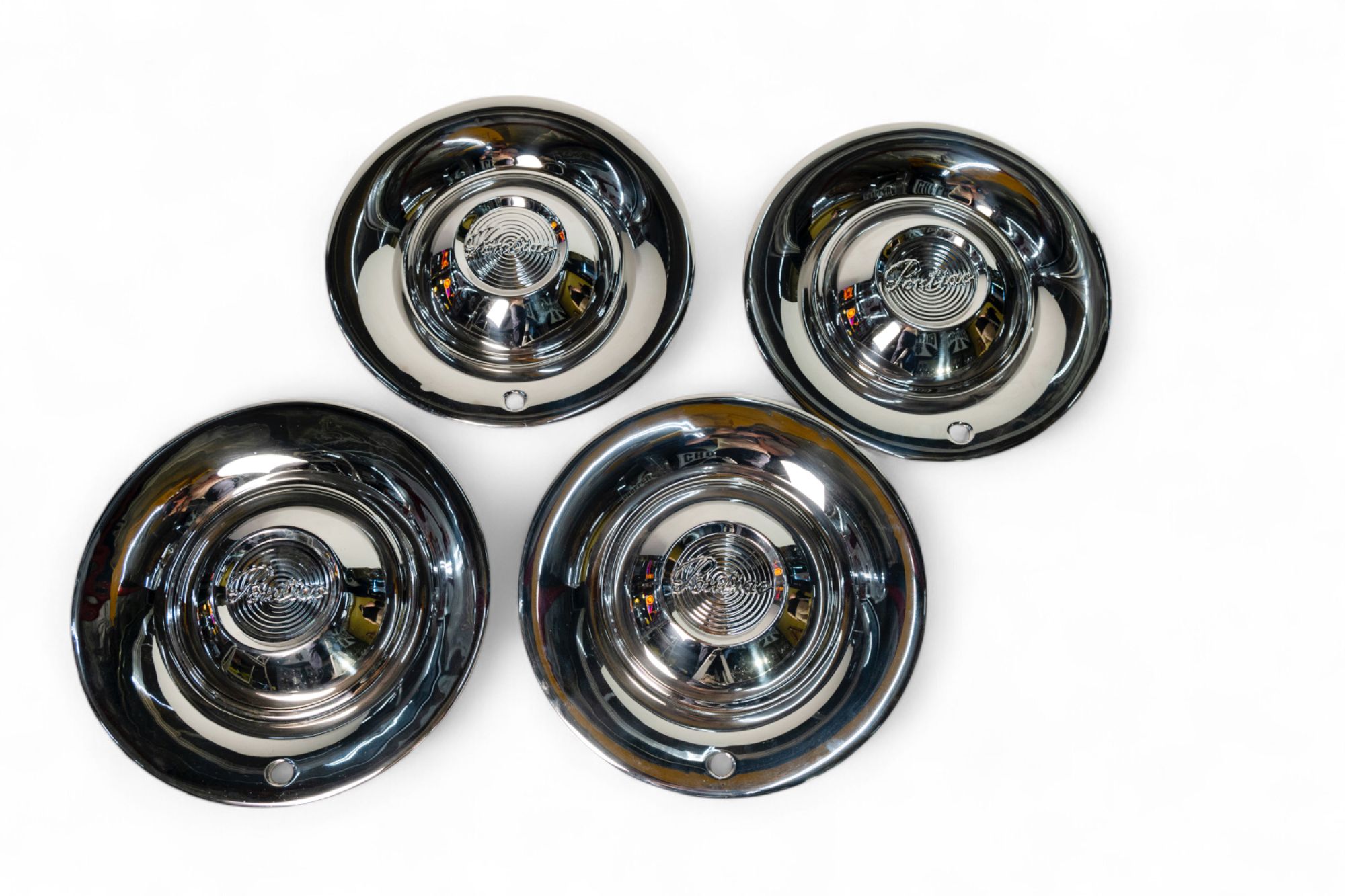 Bonhams Cars : A set of 4, 1950's Pontiac 'Sombrero' style hub caps,