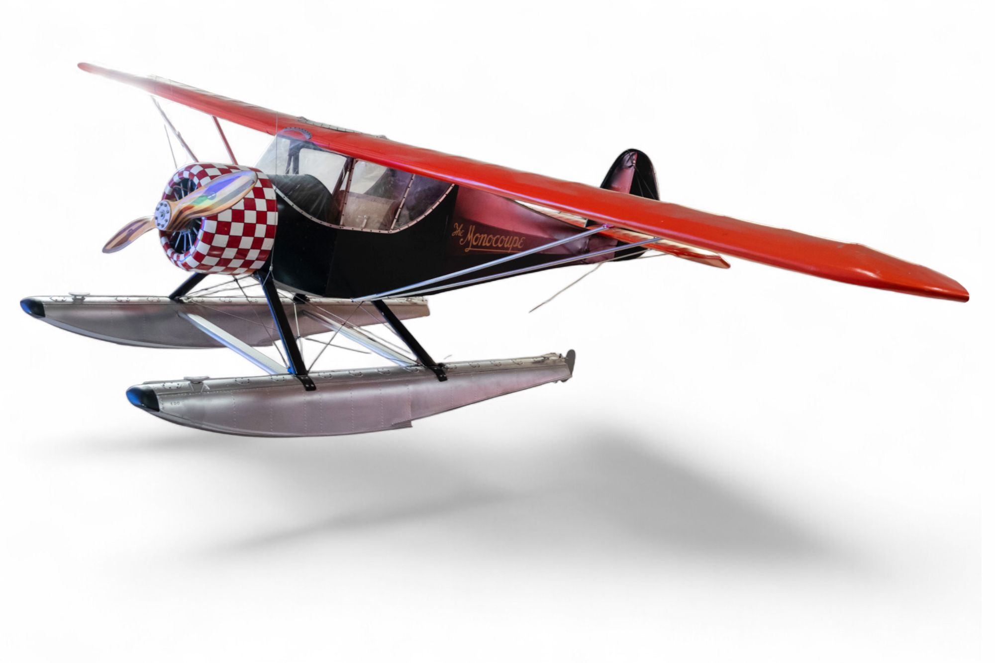Bonhams Cars : A Monocoupe Model 70 seaplane remote controlled airplane,