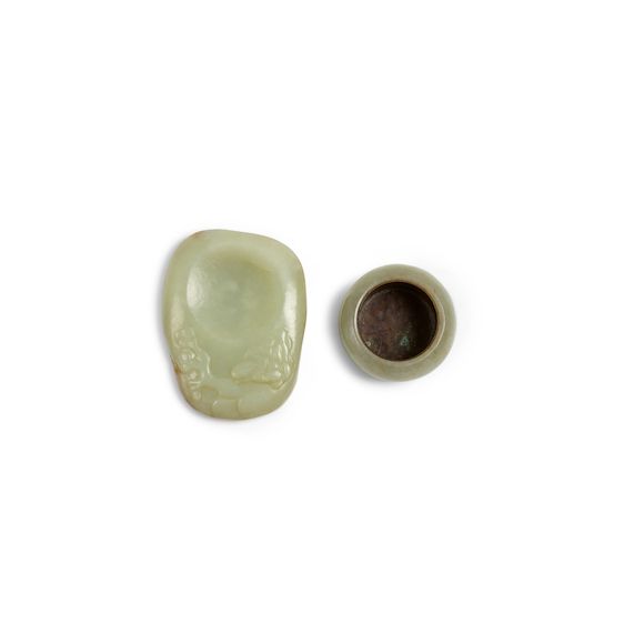 Bonhams : A JADE CARVING OF INK PALETTE AND A METAL-INSET JADE INKWELL ...