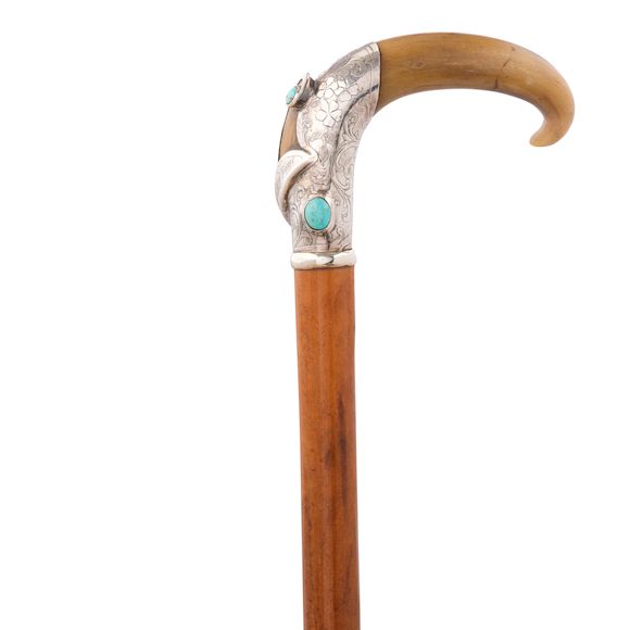 Bonhams : A TURQUOISE INSET INCISED FINE SILVER OVERLAY TWISTED COW ...