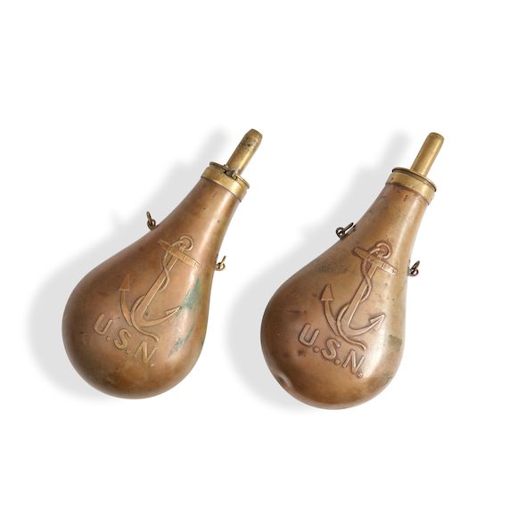 Bonhams Skinner : TWO U.S. NAVY "FOULED ANCHOR" POWDER FLASKS.