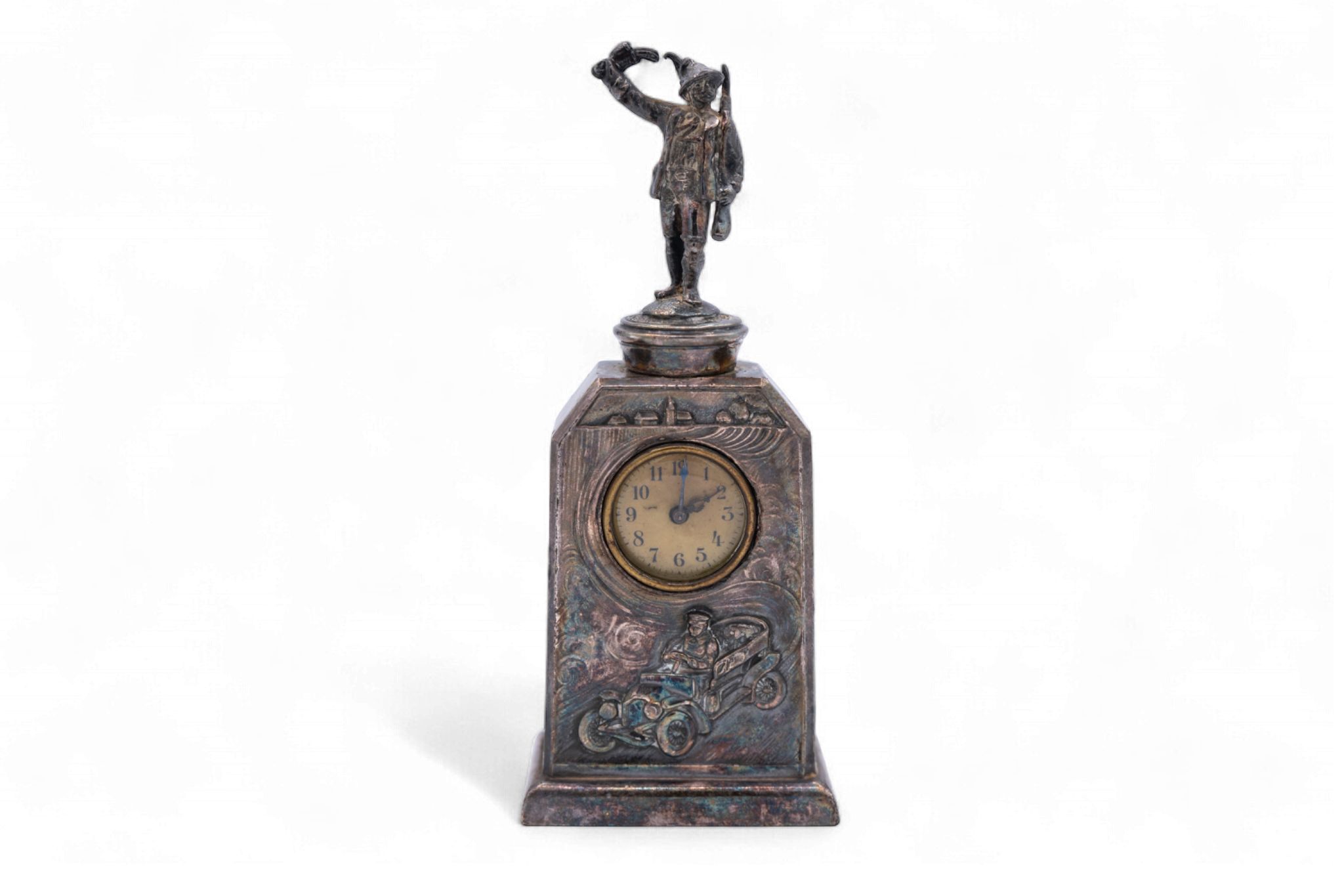 Bonhams Cars : A silver-plated German desk clock with an open seat touring car motif, circa 1910,